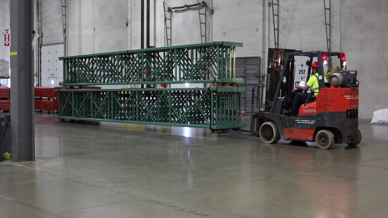 How to unload frames and beams from an enclosed trailer. - YouTube