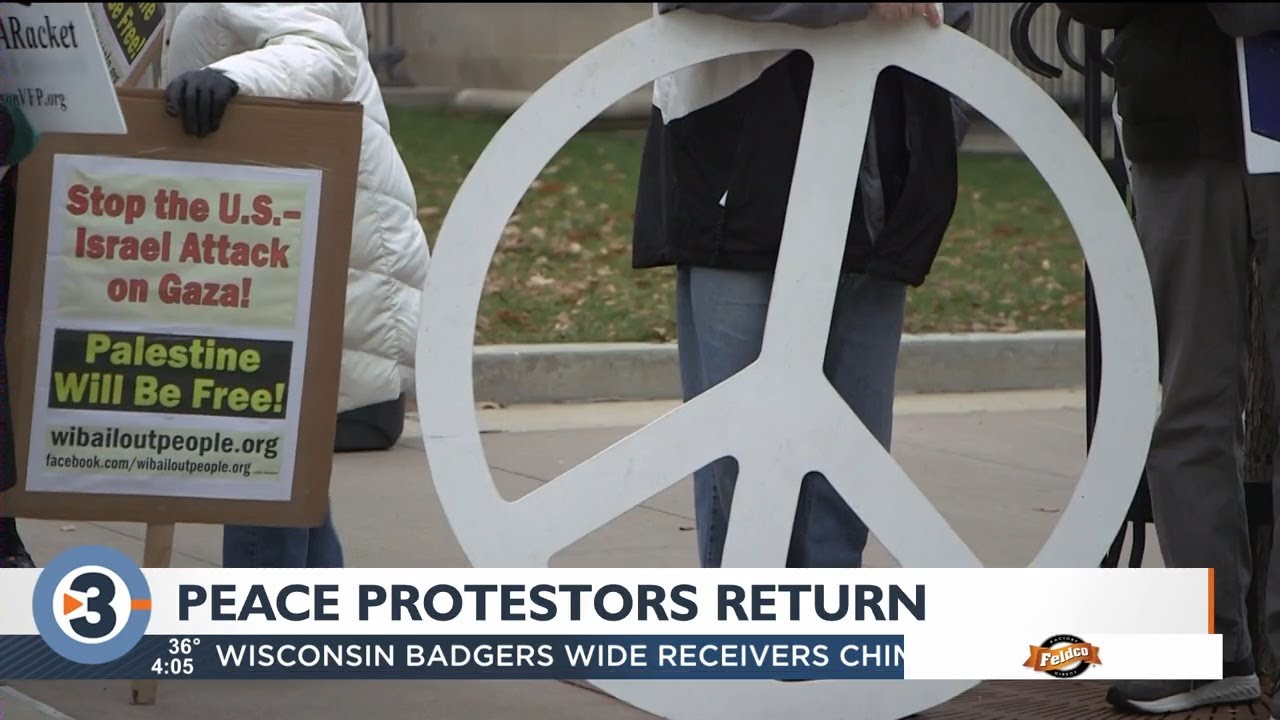 Local peace protest group returns to downtown Madison - YouTube