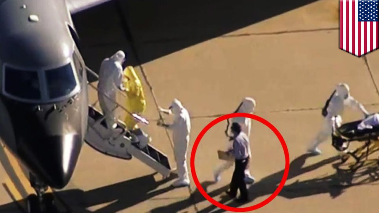 Ebola risk: Man without hazmat suits helps patient onto CDC plane ...