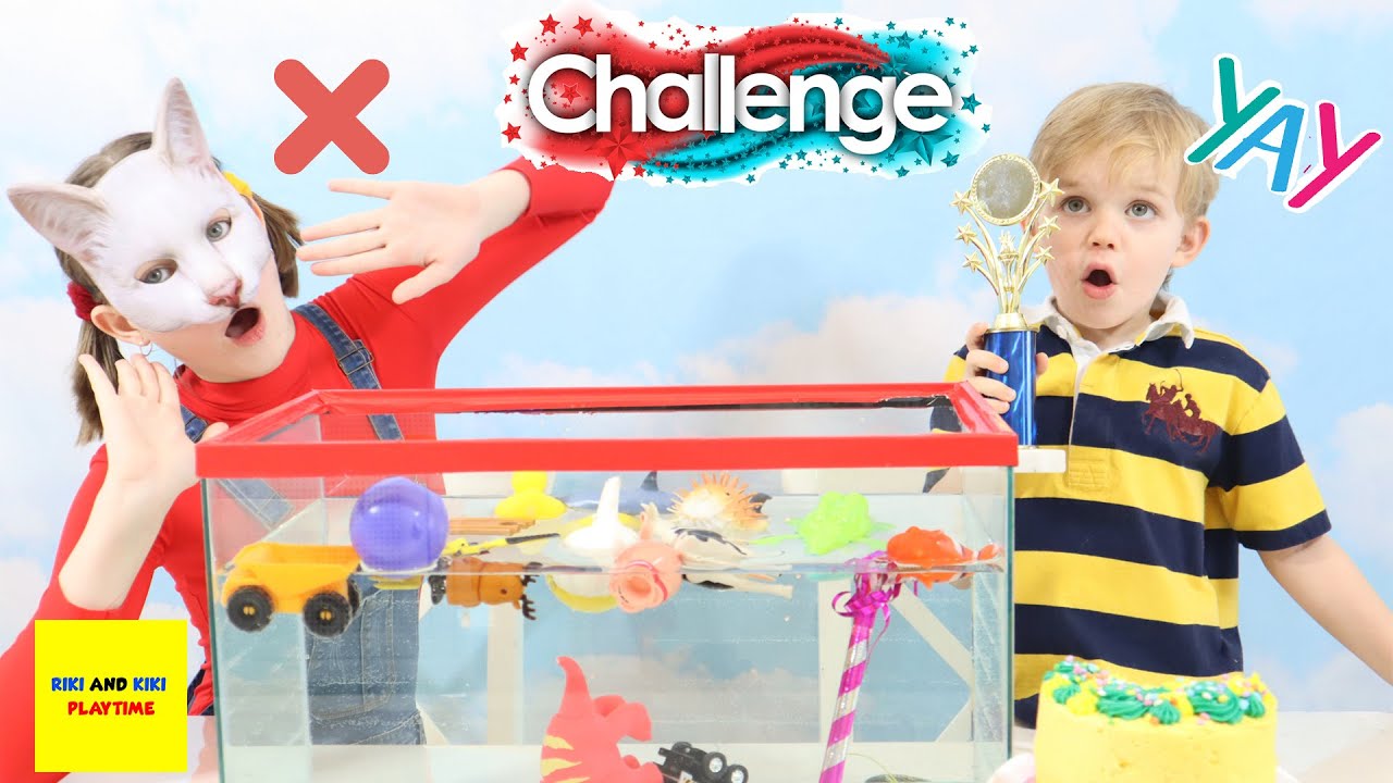 Riki and Kiki play a fun game of challenge, using a fish tank ...
