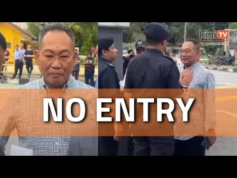 Police stop PAS MP Awang Hashim from entering court as Sanusi is ...