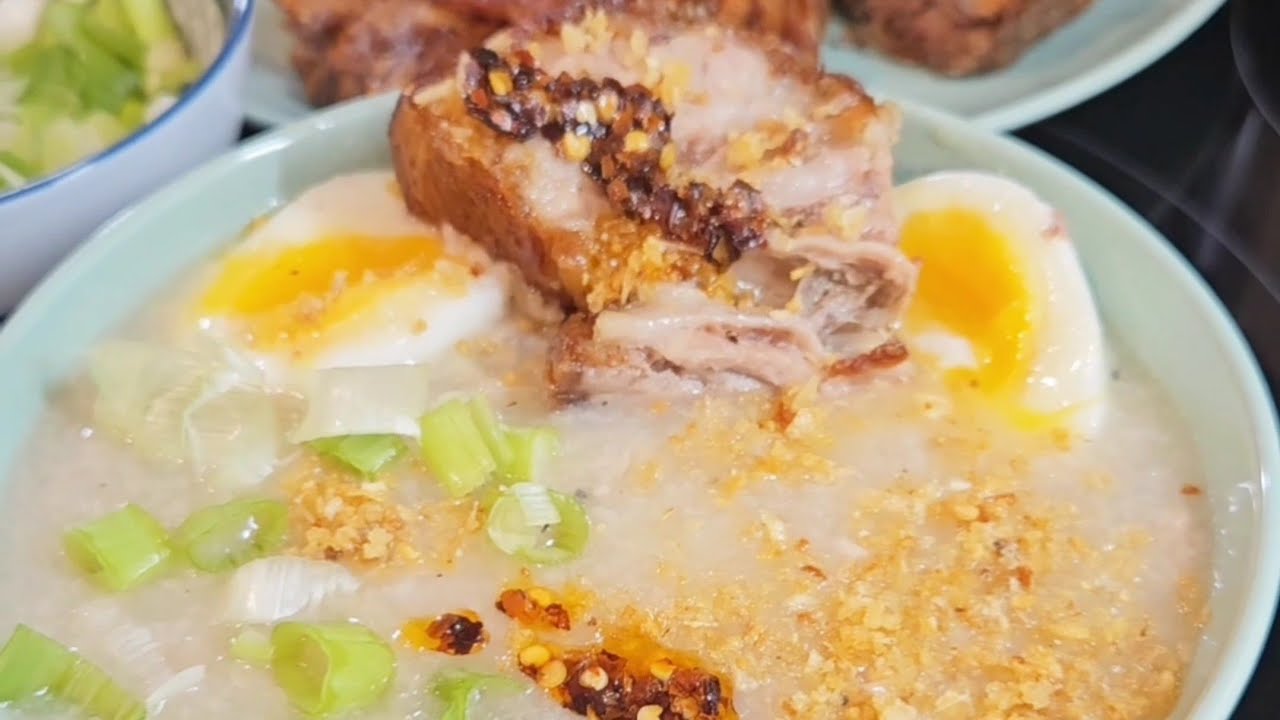 level up your lugaw topped with crispy pork belly and half boiled eggs ...