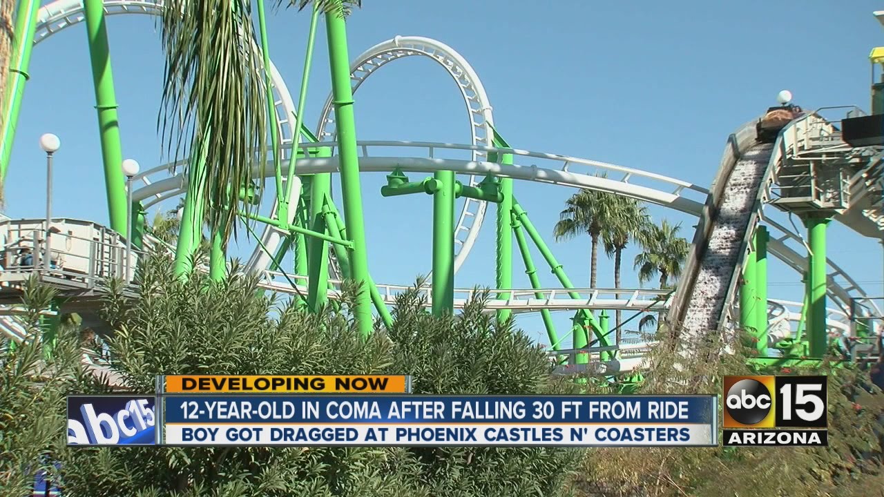 Grandfather rescues boy after falling off ride - YouTube
