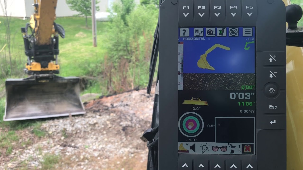 Aligning bucket to dig level - YouTube