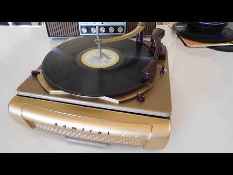 Vintage ADMIRAL 3 speed automatic record changer playing a couple LP's ...
