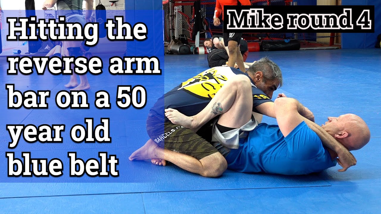 Hitting the reverse arm bar on a blue belt - YouTube
