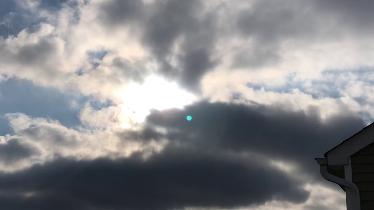 Blue orb between earth and sun - YouTube