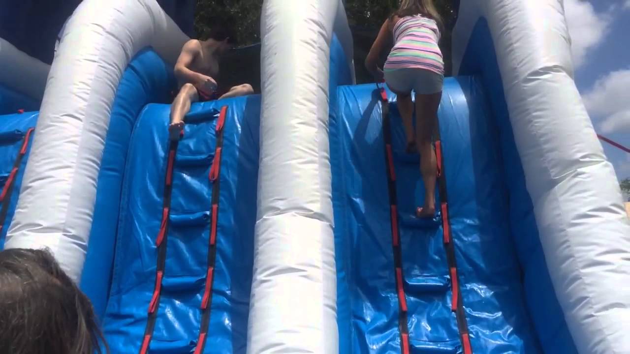 Inflatable slide accident – hilarious - YouTube