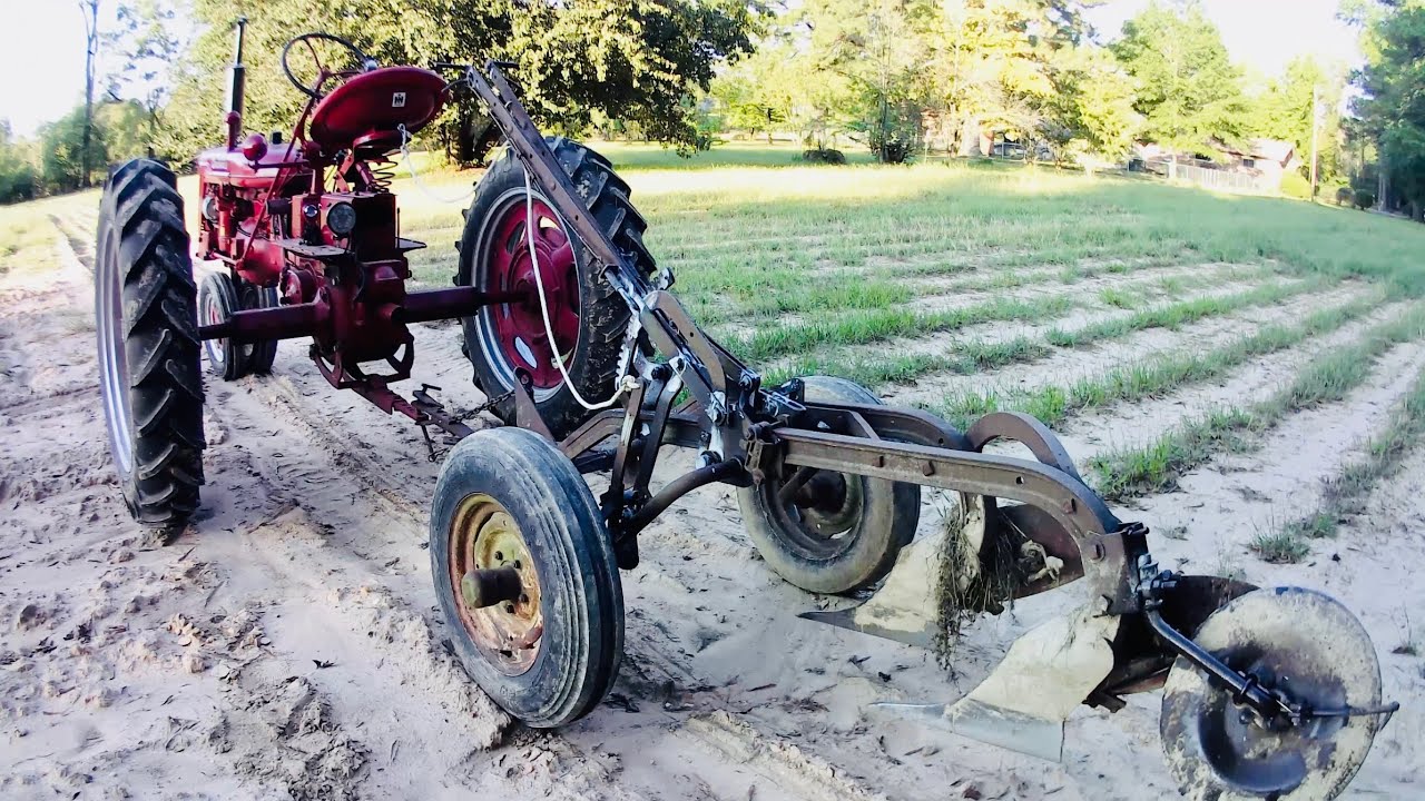 Farmall C Pulling 2 Bottom Plow - YouTube
