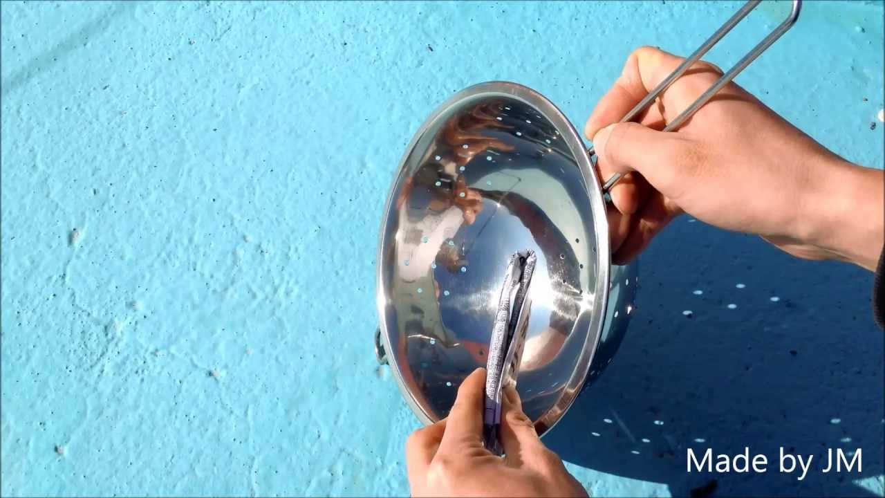 Make a fire using a stainless steel colander 2 (스테인레스 채반으로 불 피우기) - YouTube