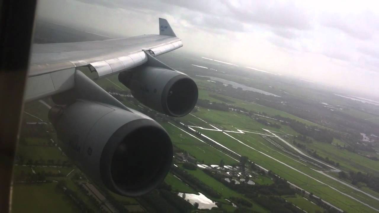 KLM Boeing 747-400 combi landing at schiphol airport rwy 27 wing view ...