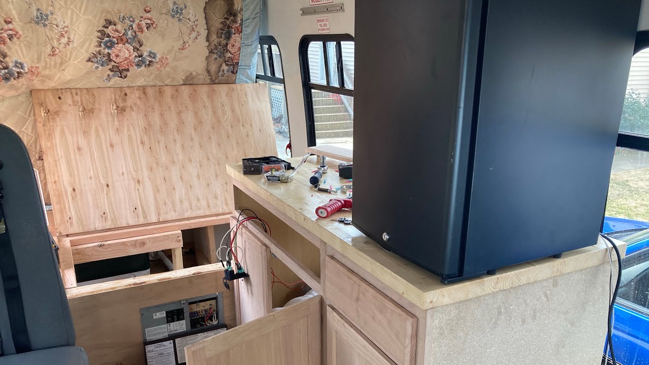 Shuttle bus camper conversion almost campable! What! - YouTube