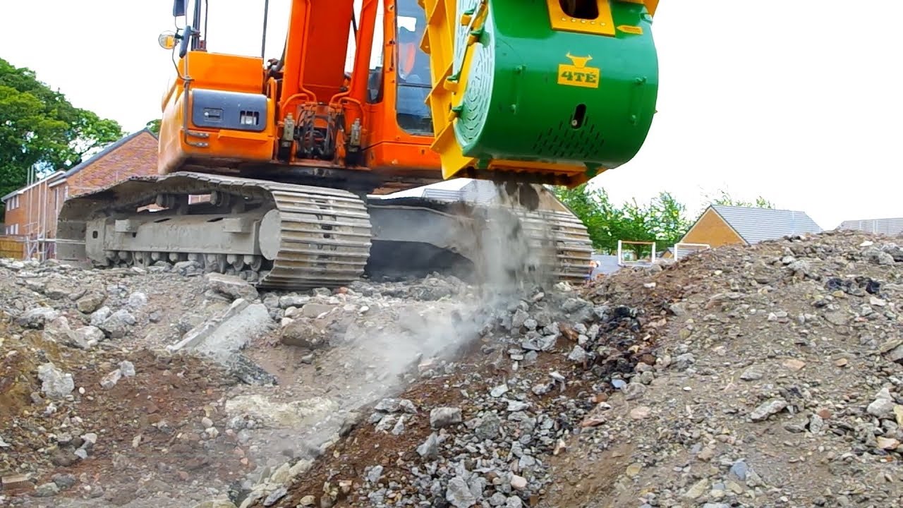 Crusher Bucket in action! - YouTube