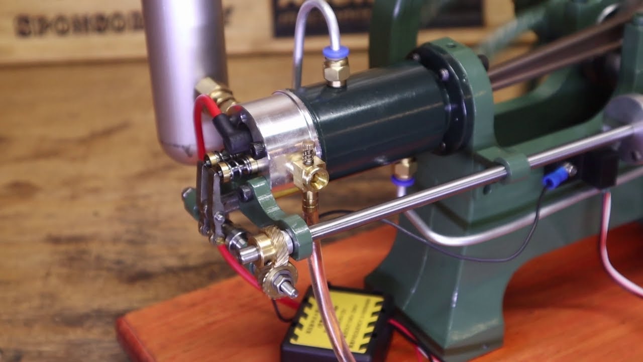 Starting up a miniature Mill engine from Stirlingkit. - YouTube