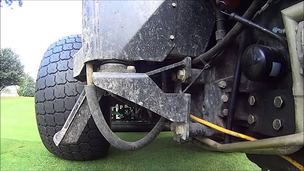Greenkeepers coring greens - YouTube