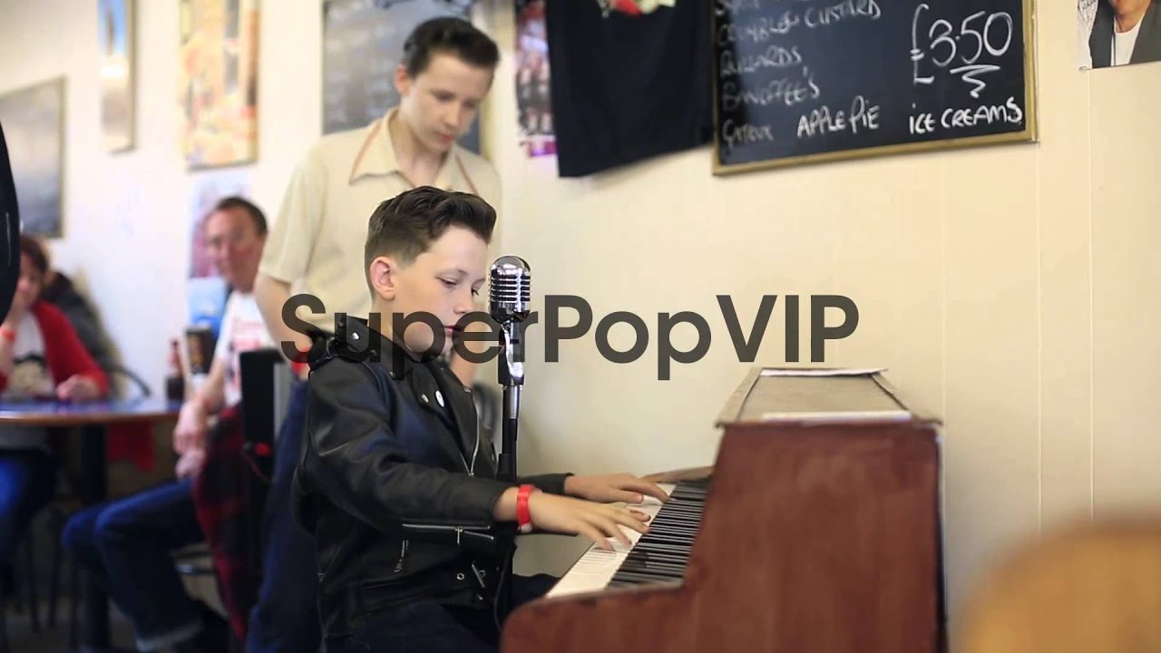 Mid shot of Lewis Jordan Brown performing a rock n' roll ... - YouTube