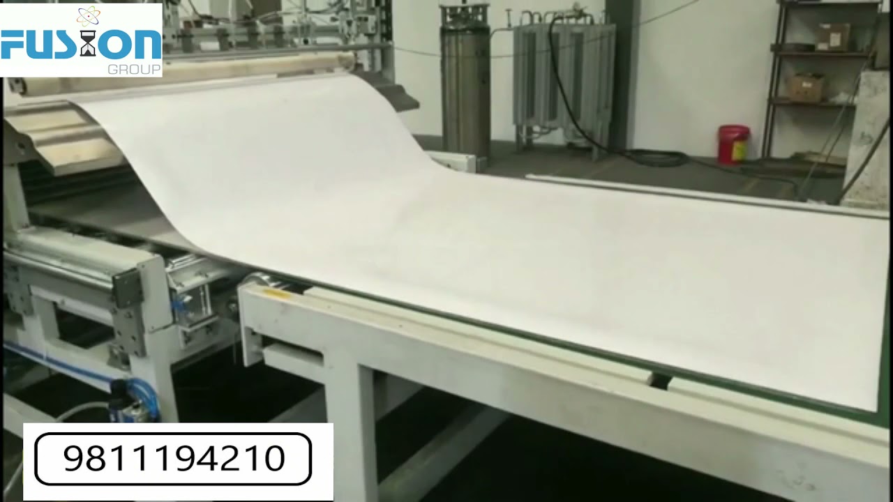 Auto sheet feeder for PUR laminating production line - YouTube