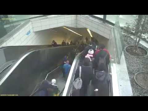 Man sucked into escalator - YouTube