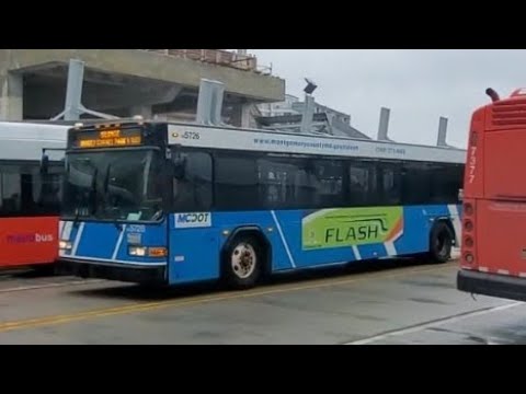 FLASH (orange line bus) operated by Ride On goes through silverspring md #flashbus