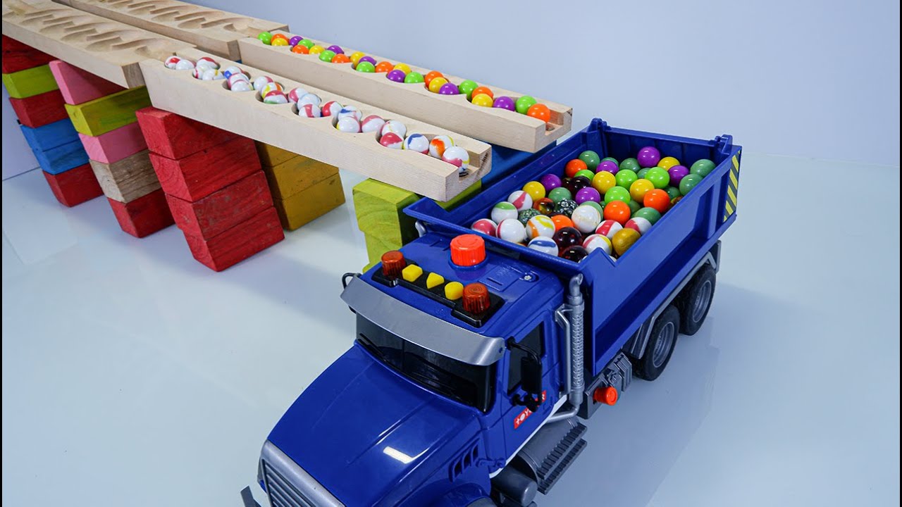 Marble, Haba slope. tractors, garbage trucks and container trucks ...