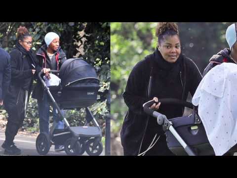 Janet Jackson steps out with baby Eissa for the first time since giving birth. Awww