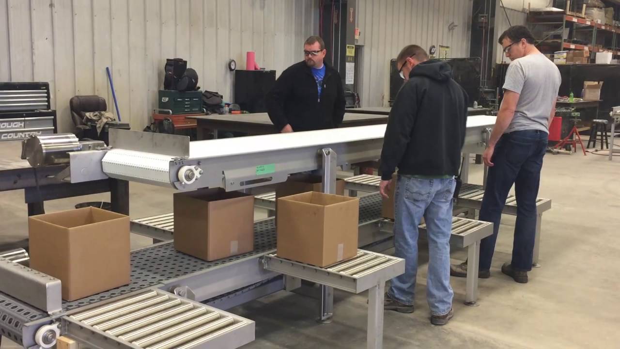 Two-Tier Pack Off Conveyor - YouTube