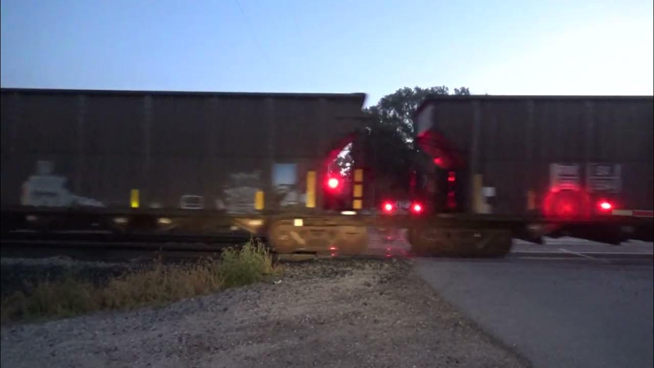 BNSF 6116 and MRL 4316 pull an empty coal train at Pacific Junction, Iowa. - YouTube