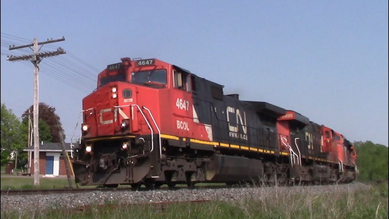 BCOL 4647 (CN Paint) Leads a Long Freight Train CN 507 Passing thru ...