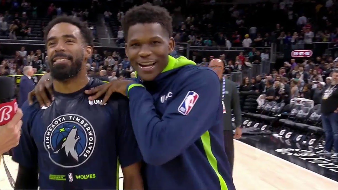Anthony Edwards pours water on Mike Conley following win - YouTube