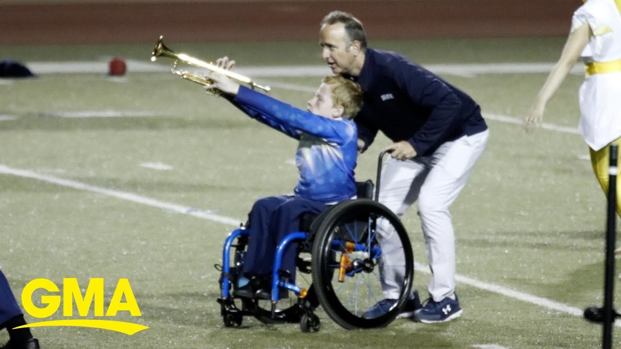 High school band director helps student perform with marching band l ...