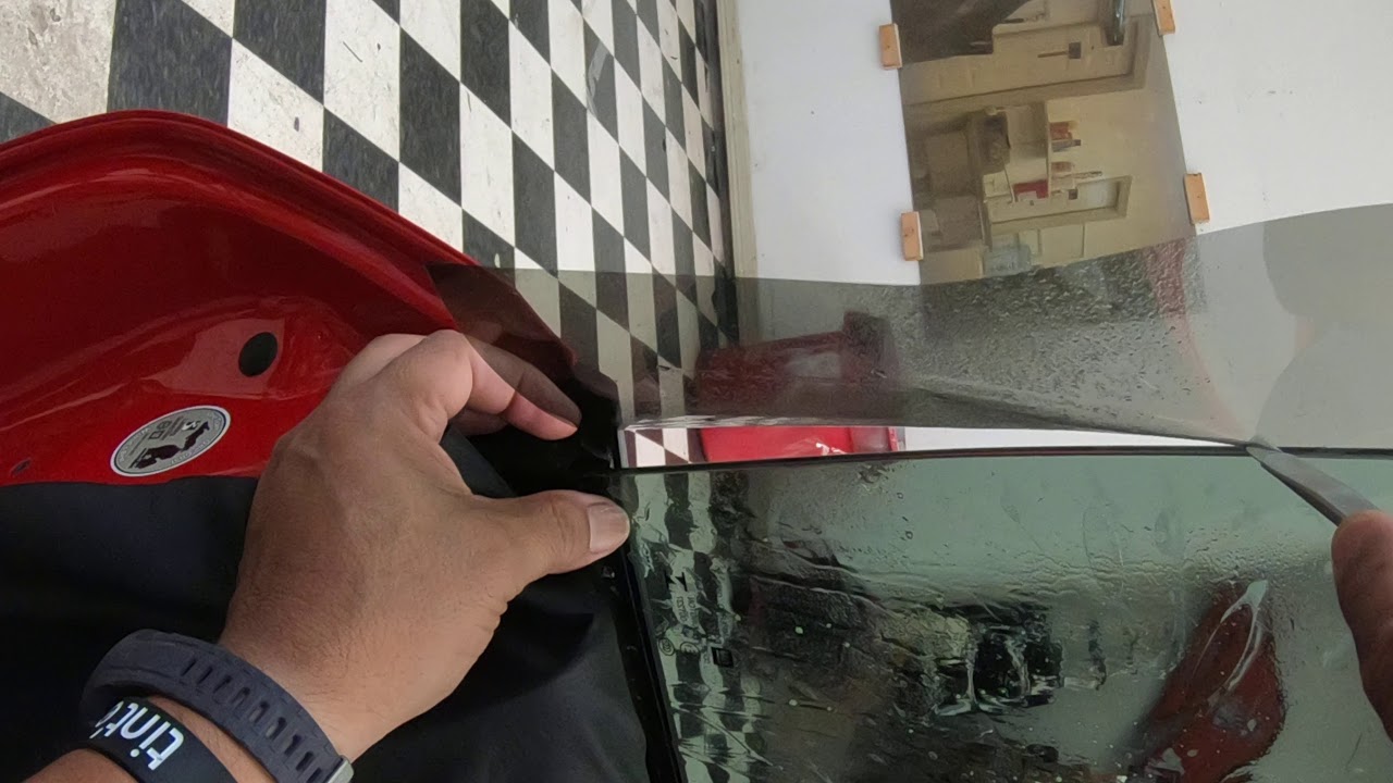Window Tinting a Frameless Door Hand Cutting on Inside Of Frame ...