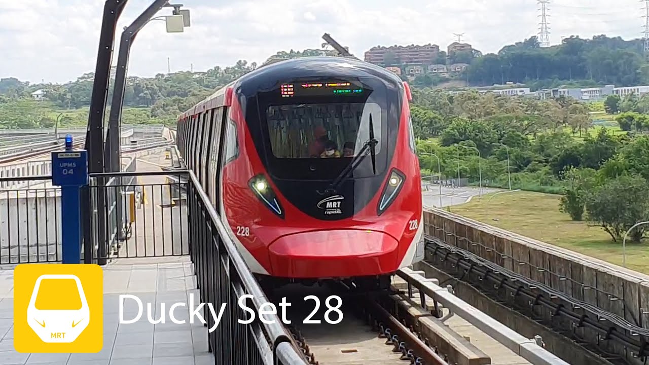 MRT PUTRAJAYA LINE (SSP LINE) DUCKY SET 28 ARRIVING & DEPARTING AT UPM ...