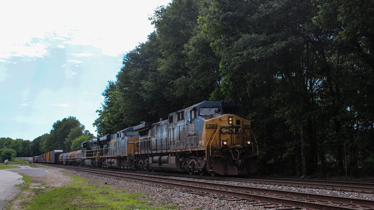 CSX M692 with Seaboard Coast Line unit trailing at Roebuck - YouTube