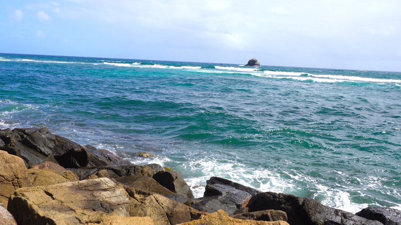 Listen to the sounds of rough ocean waves of the Caribbean Sea crashing ...