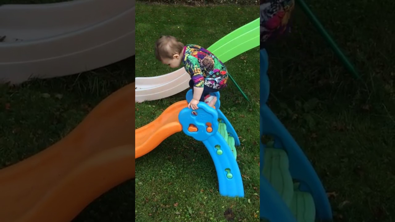 Baby falls off slide - YouTube