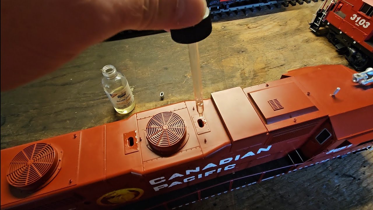 filling a G scale train with smoke fluid - YouTube