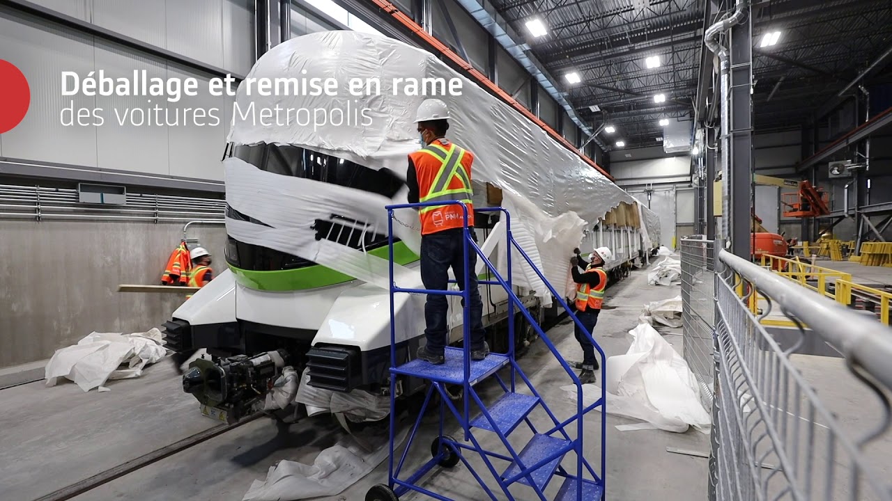 REM first car delivered - mtltimes.ca - YouTube