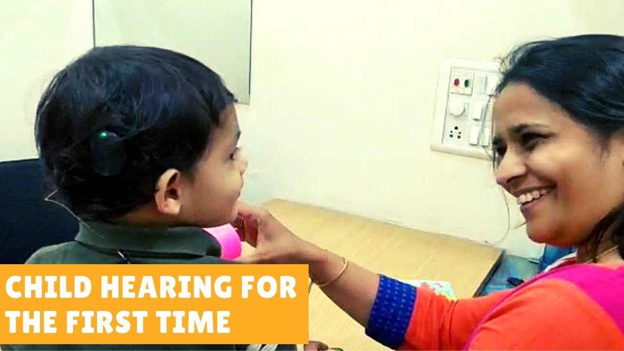 Cute Child Hearing For The First Time With Hearing Machine - YouTube