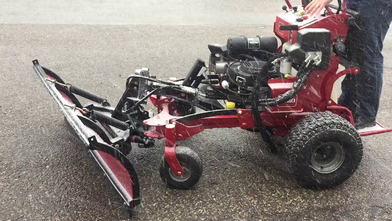 Toro Multiforce with snow blade - YouTube