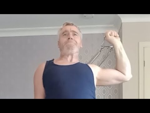 Rob-Botics does the Joe bonomo chest expander workout - YouTube