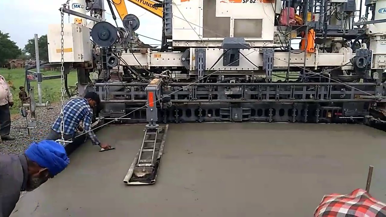 CC Road construction by paver machine - YouTube