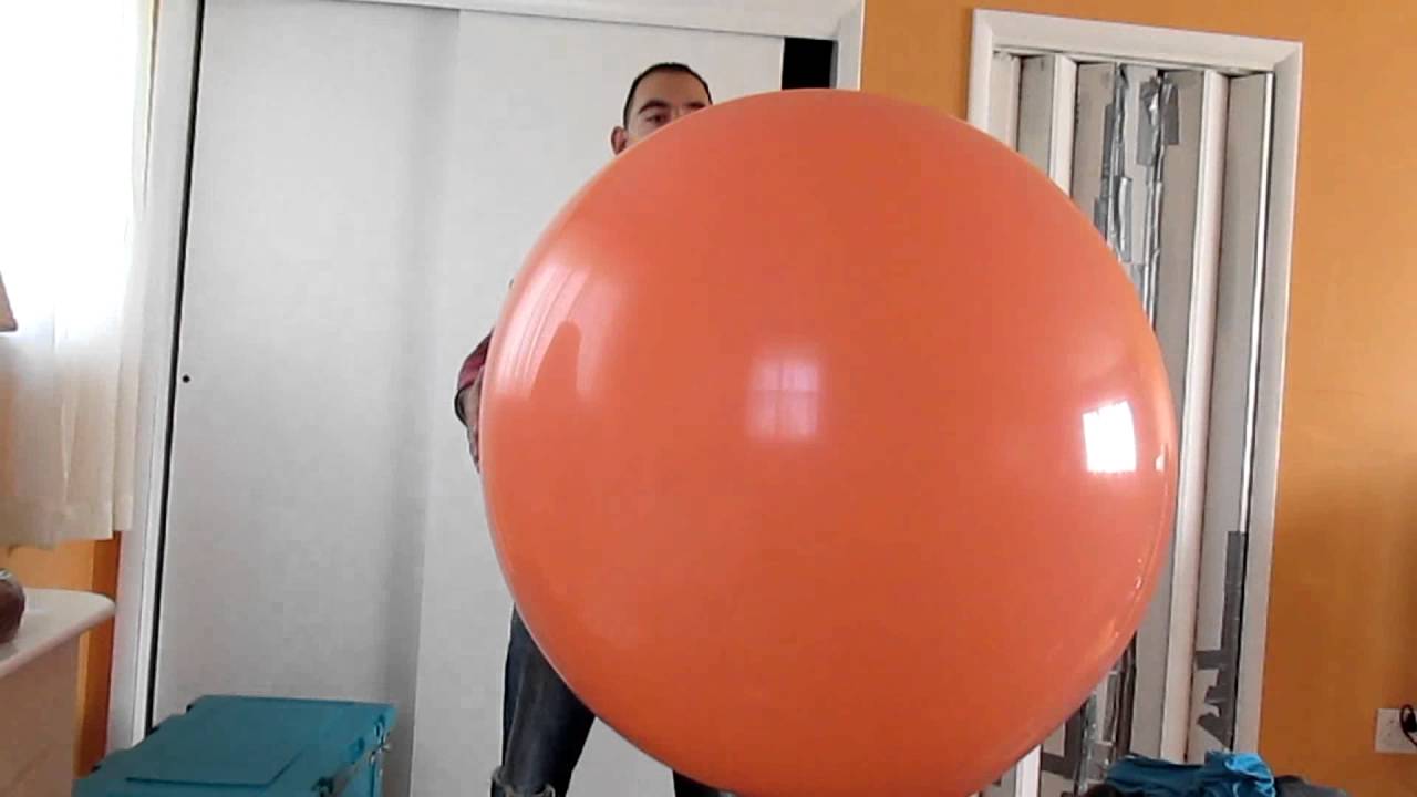 Slow motion balloon popping video in hd - YouTube