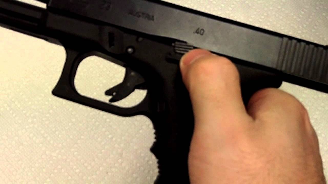 One handed Glock Takedown - YouTube