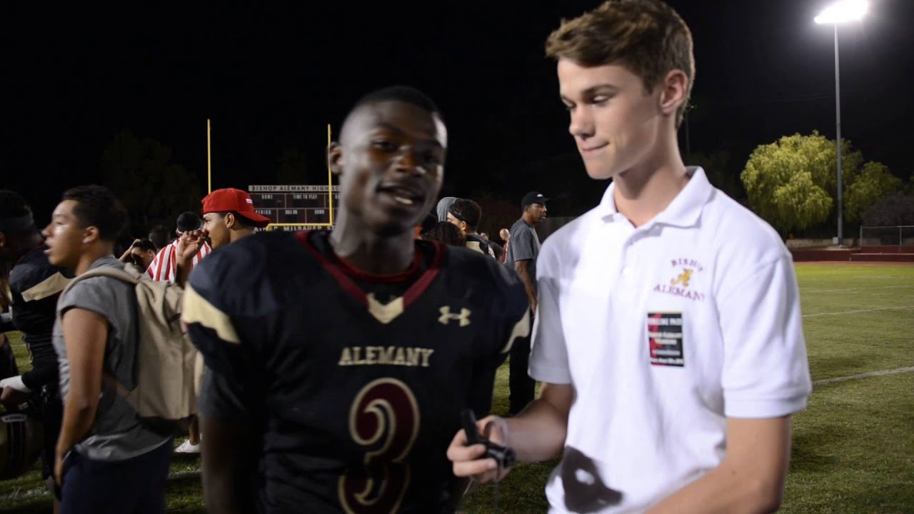 Charlie Brady with Jarrin Pierce after the 61-7 win over Garfield - YouTube