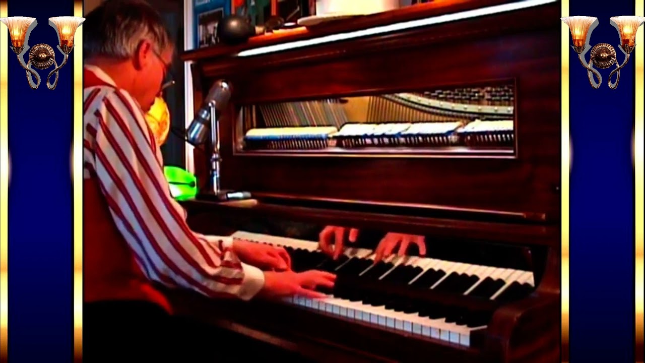 Joe Rinaudo plays vigorously on the Fotoplayer / Gary Landgren on the ...