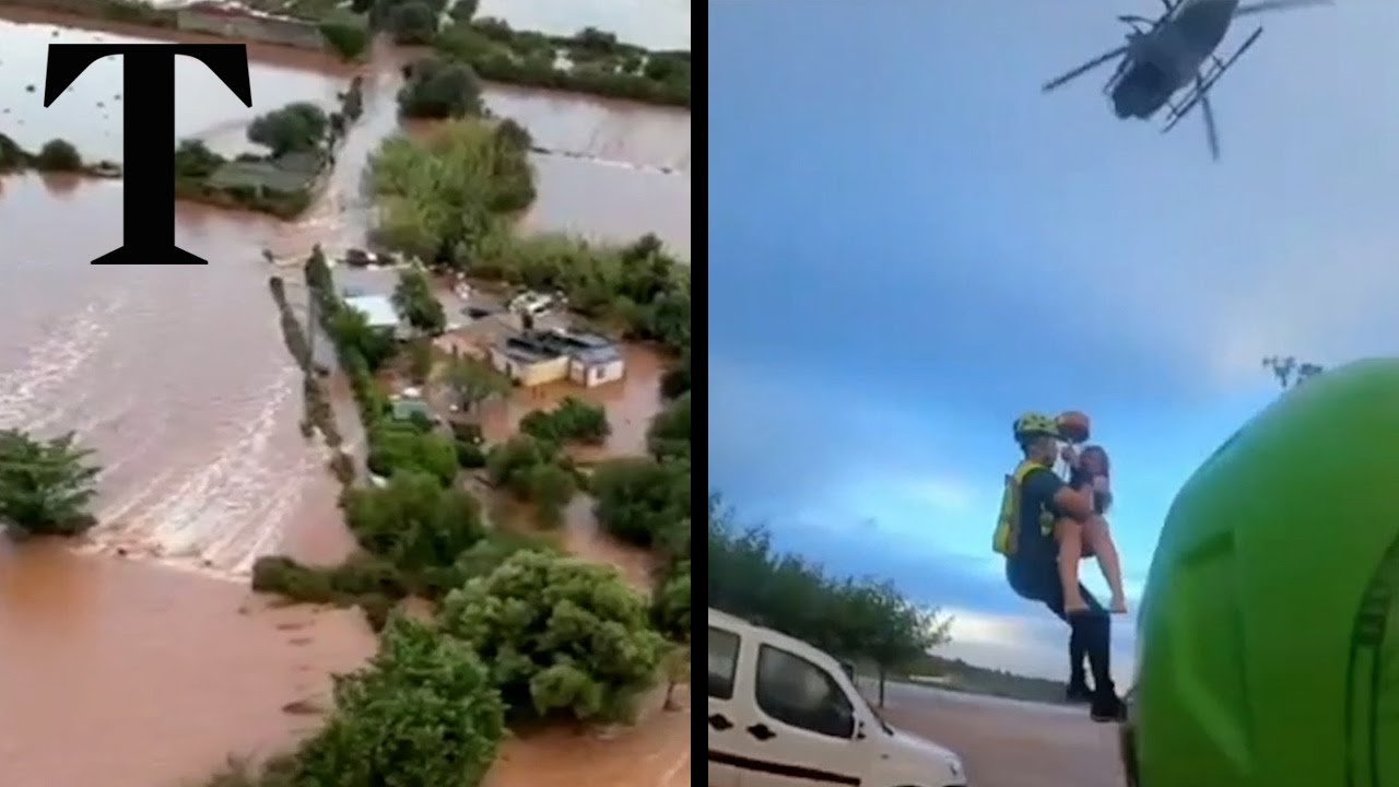 Helicopter rescues residents in flood-hit Menorca - YouTube