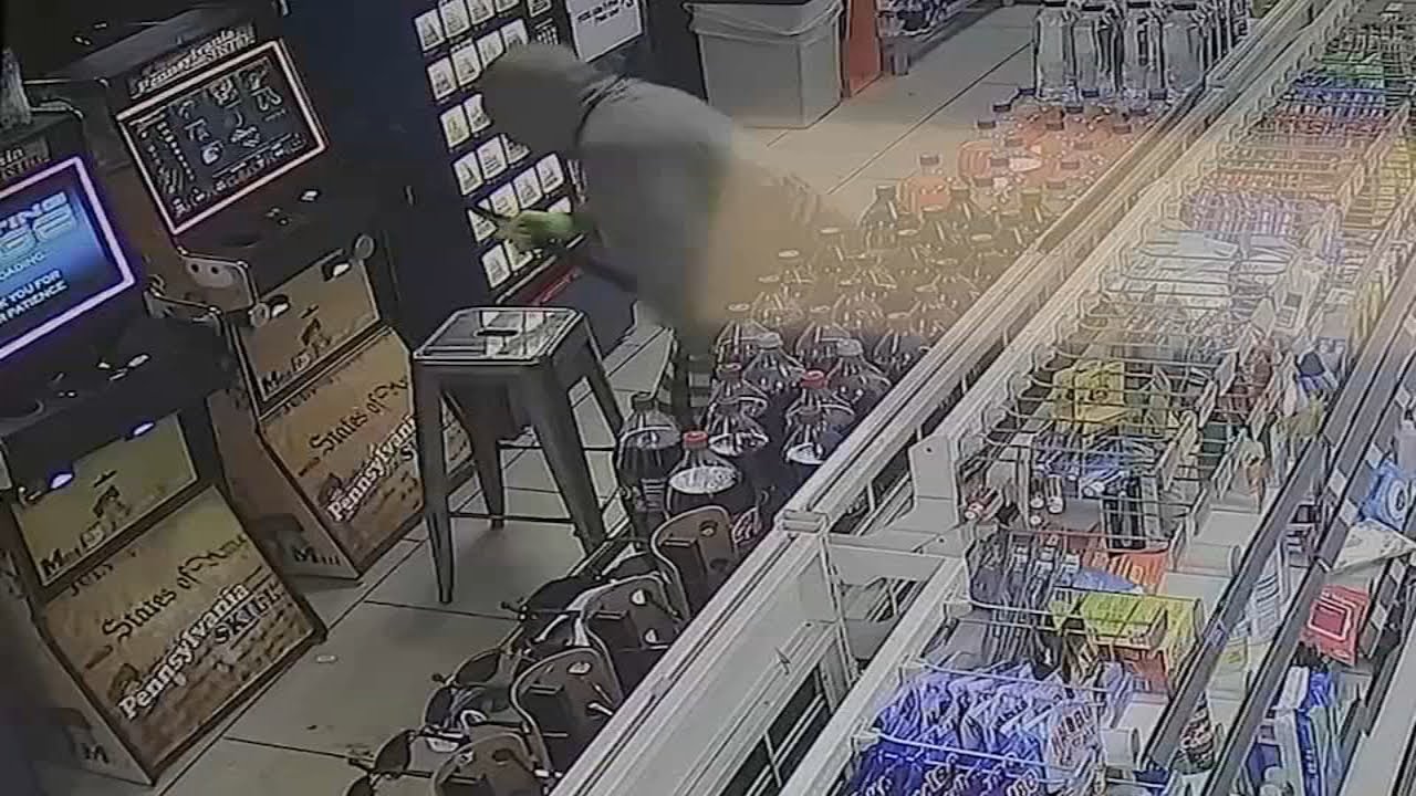 Video shows ax-wielding man trying to break into 7-Eleven 'games of ...