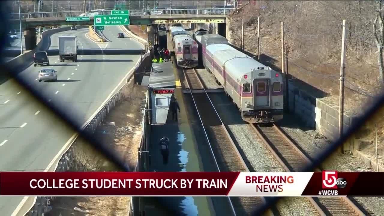 Woman hit by train suffers head injury - YouTube