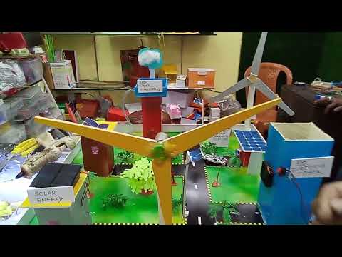 City with air purifying tower with solar and wind energy system ...