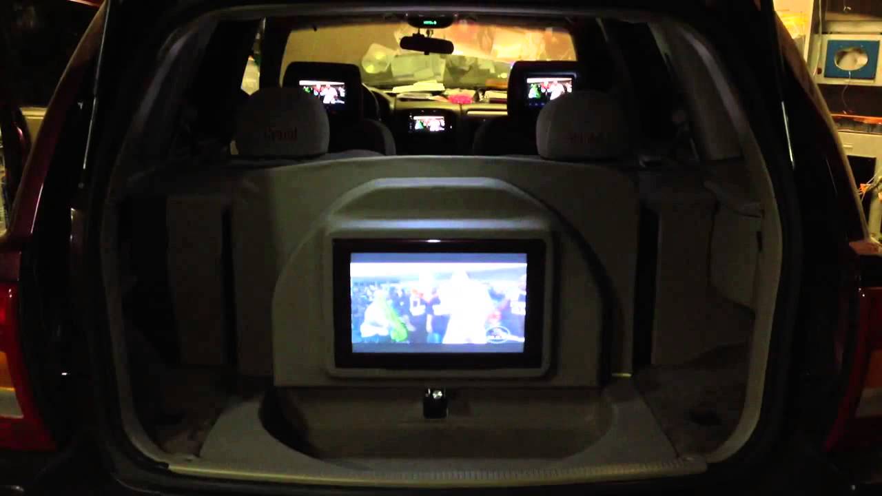 Custom stereo and motorized TV in a jeep - YouTube